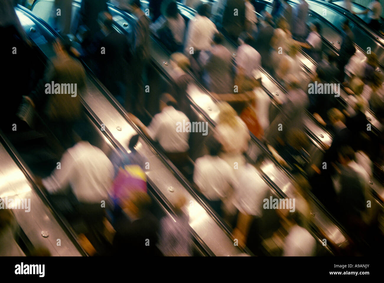 CROWD OF COMMUTERS ON ESCALATORS Stock Photo - Alamy