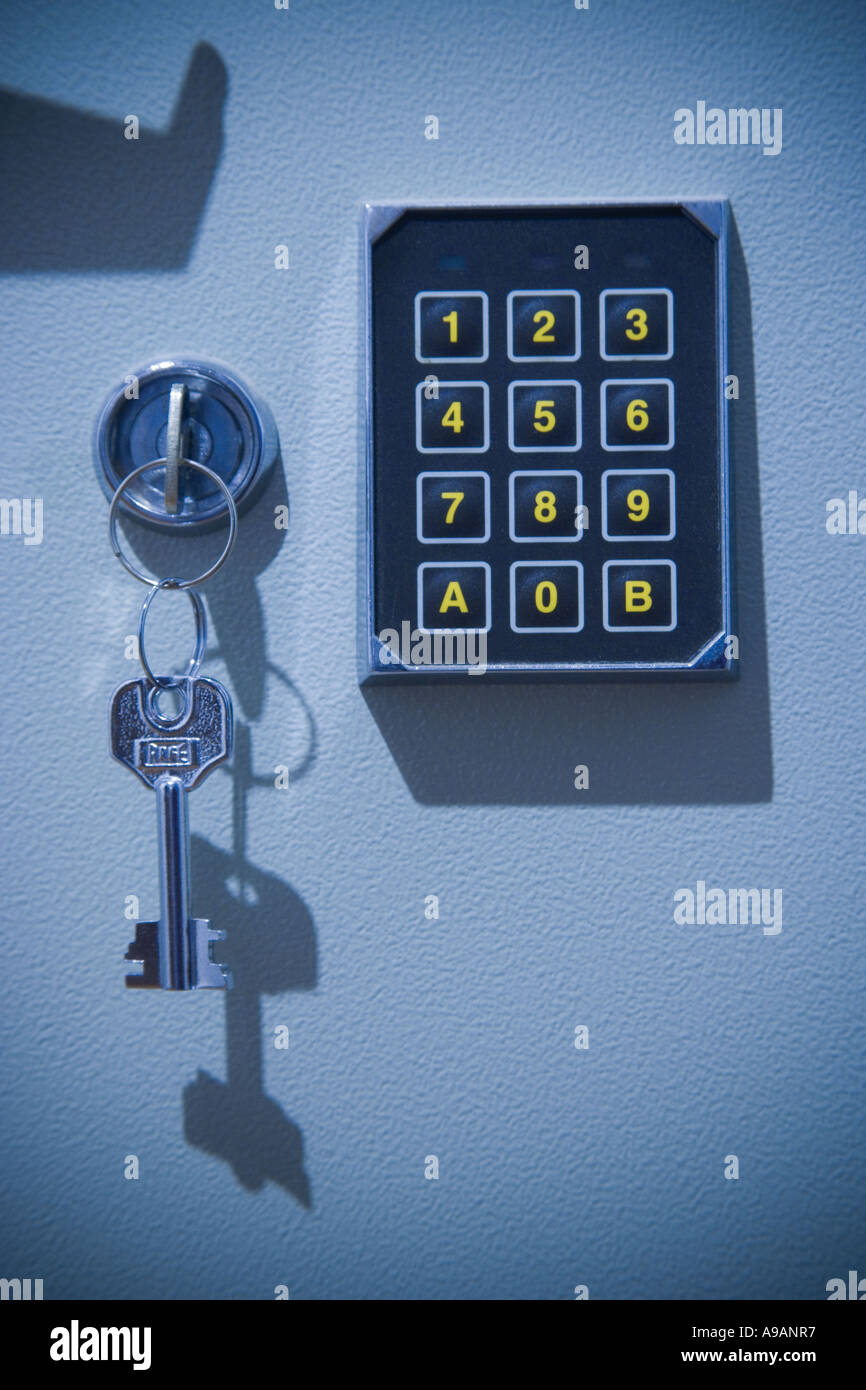 Safe with combination system and key Stock Photo - Alamy