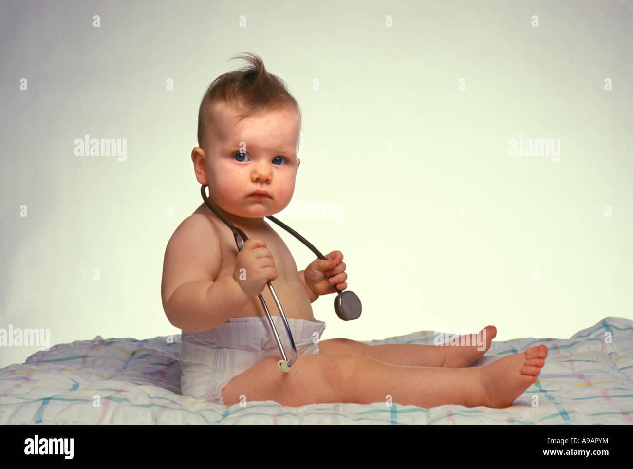Baby and stethoscope hi-res stock photography and images - Alamy
