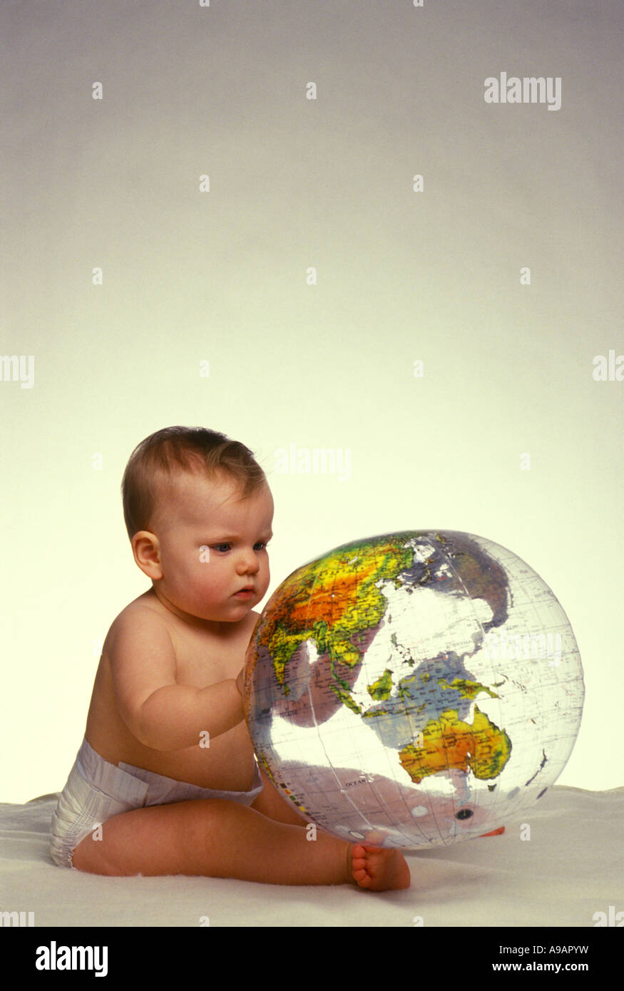 INFANT BABY PLAYING WITH PLASTIC PLANET EARTH GLOBE Stock Photo - Alamy
