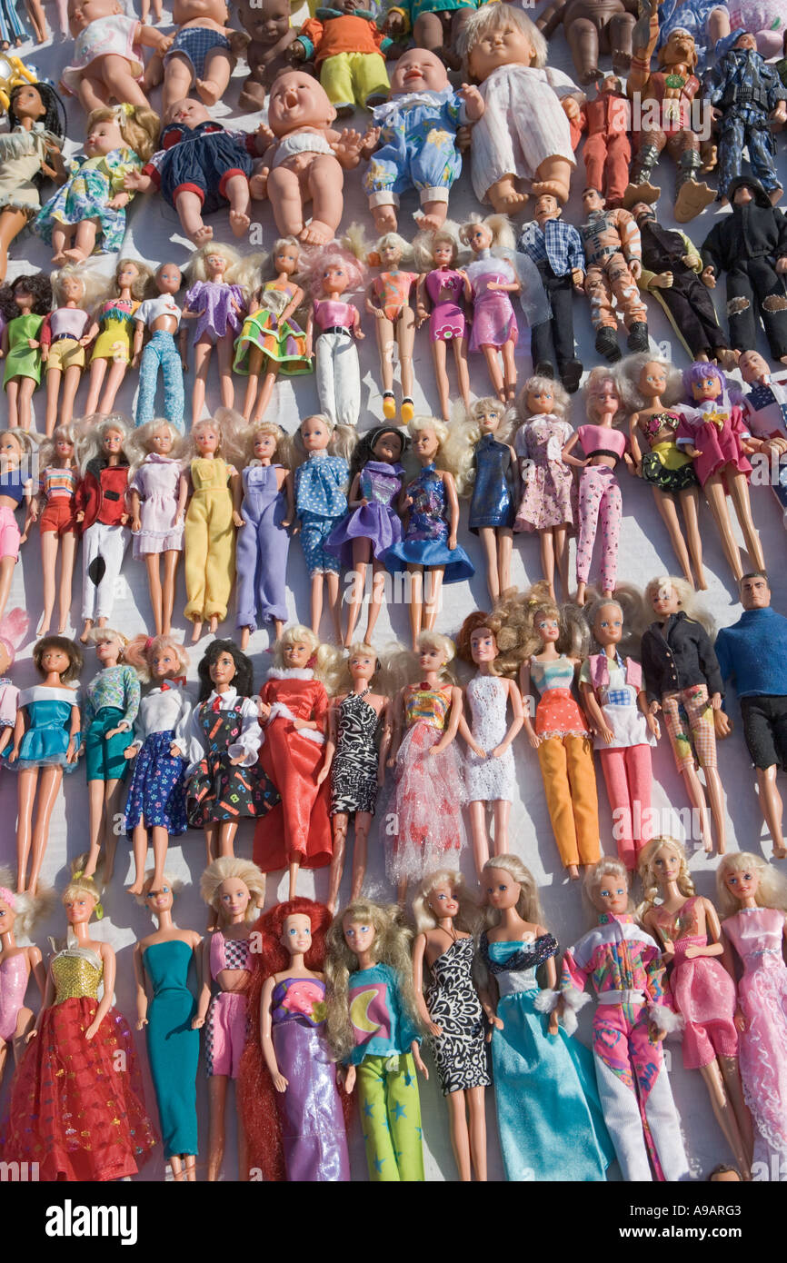 Collection of dolls at outdoor market Stock Photo - Alamy