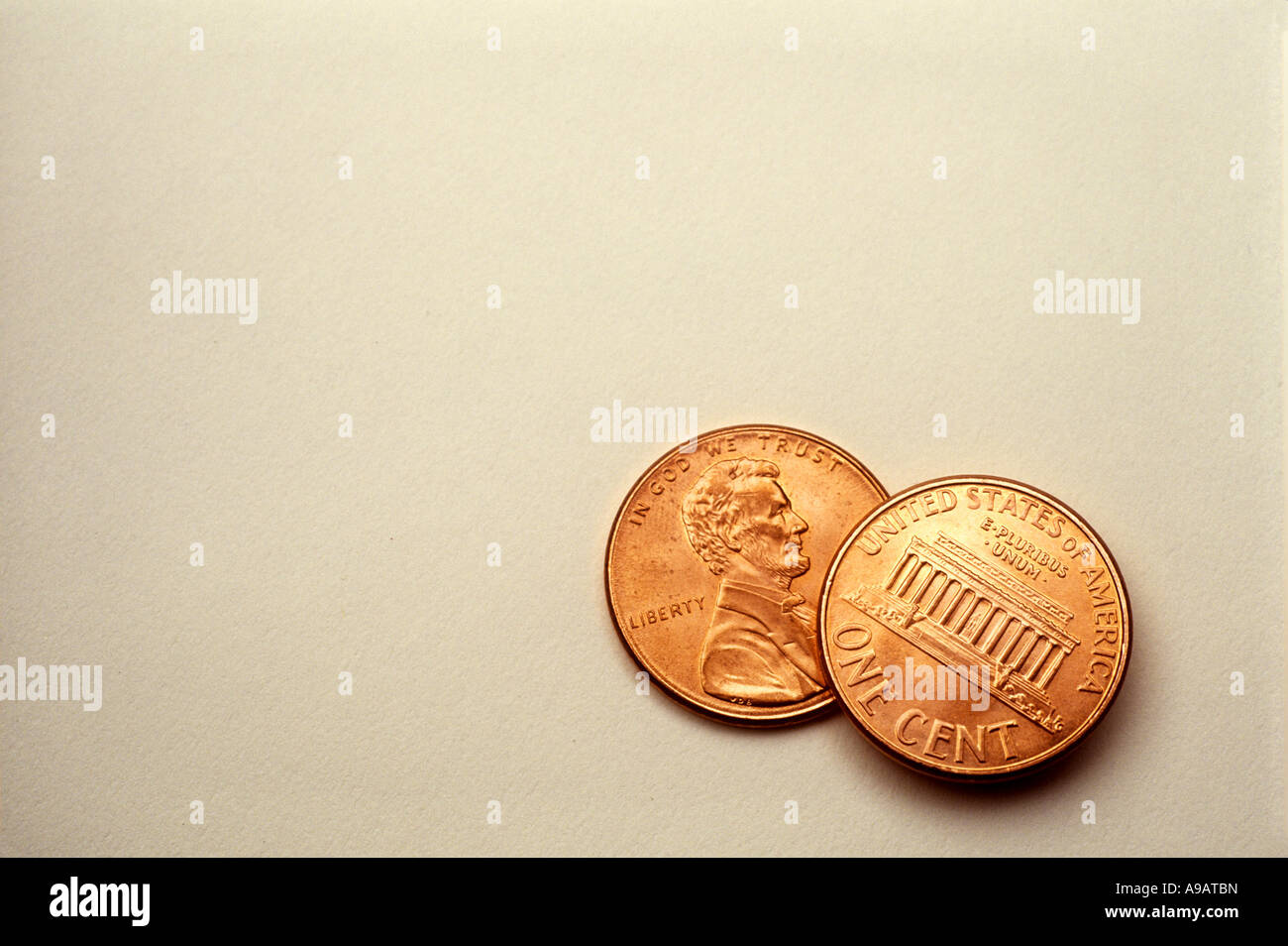 TWO UNITED STATES CENTS ON PLAIN WHITE BACKGROUND Stock Photo - Alamy
