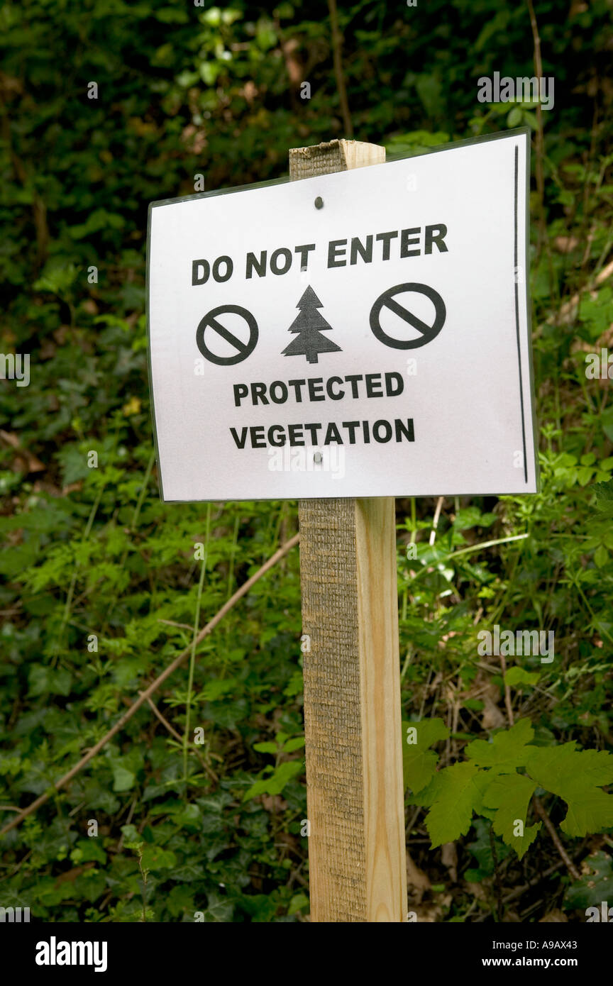 Do not enter sign for protected vegetation at edge of forest South ...