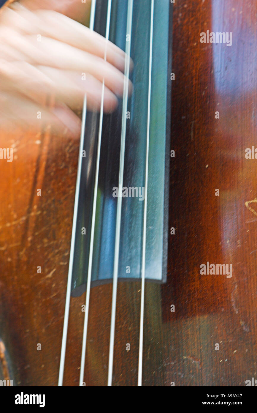 Hand plucking strings hi-res stock photography and images - Alamy