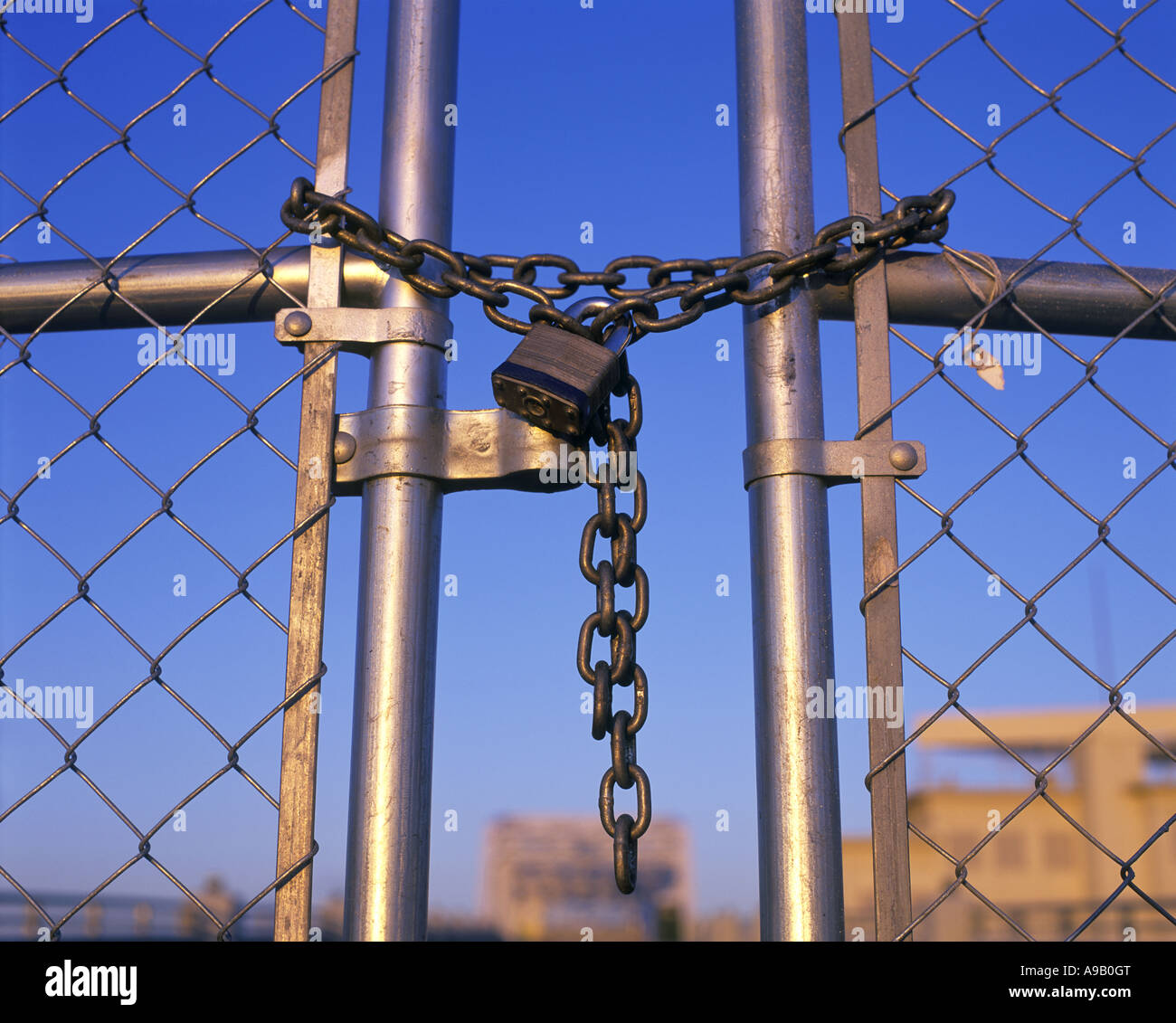 PADLOCKED SECURITY GATE Stock Photo - Alamy