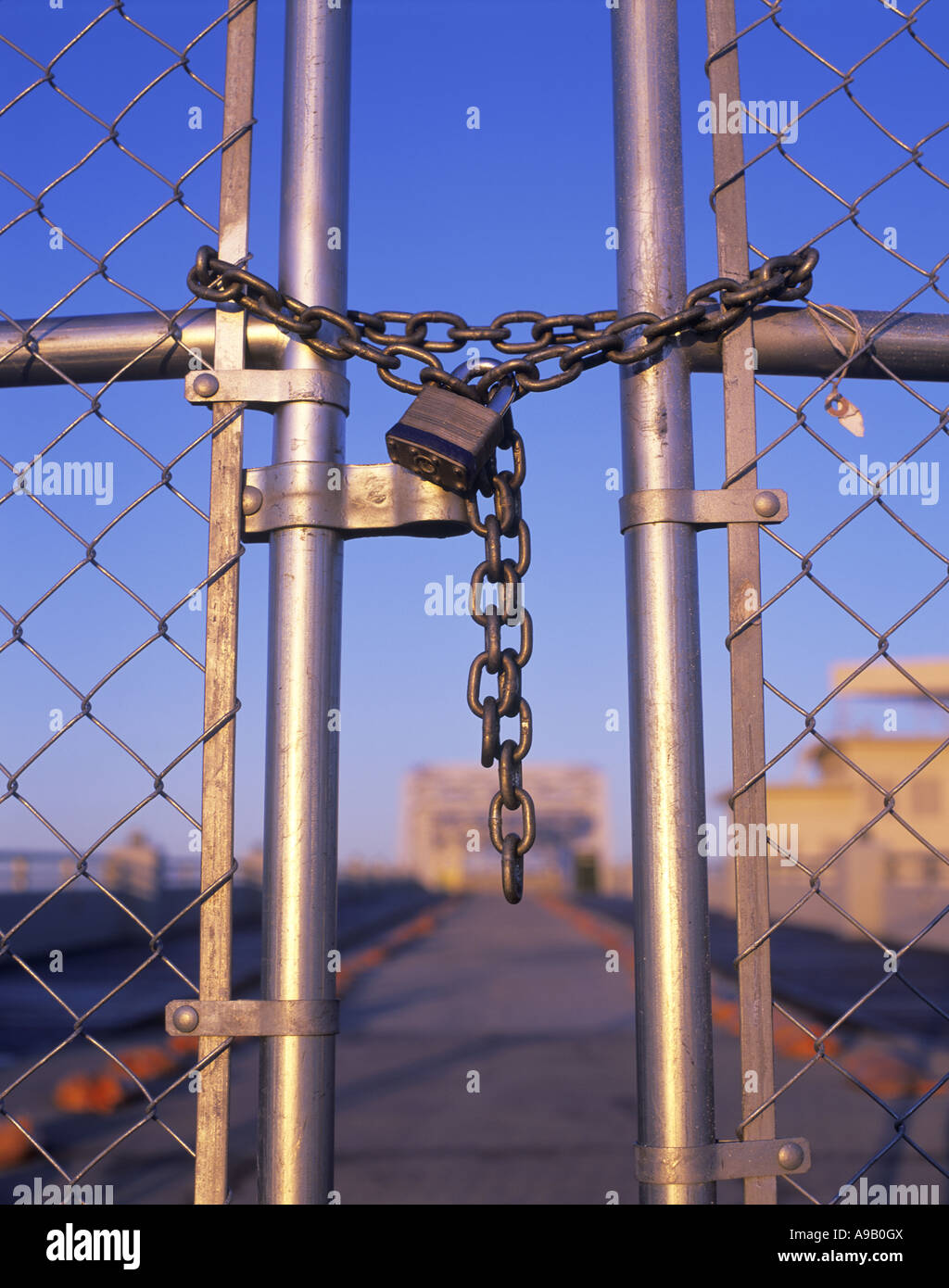 PADLOCKED SECURITY GATE Stock Photo - Alamy