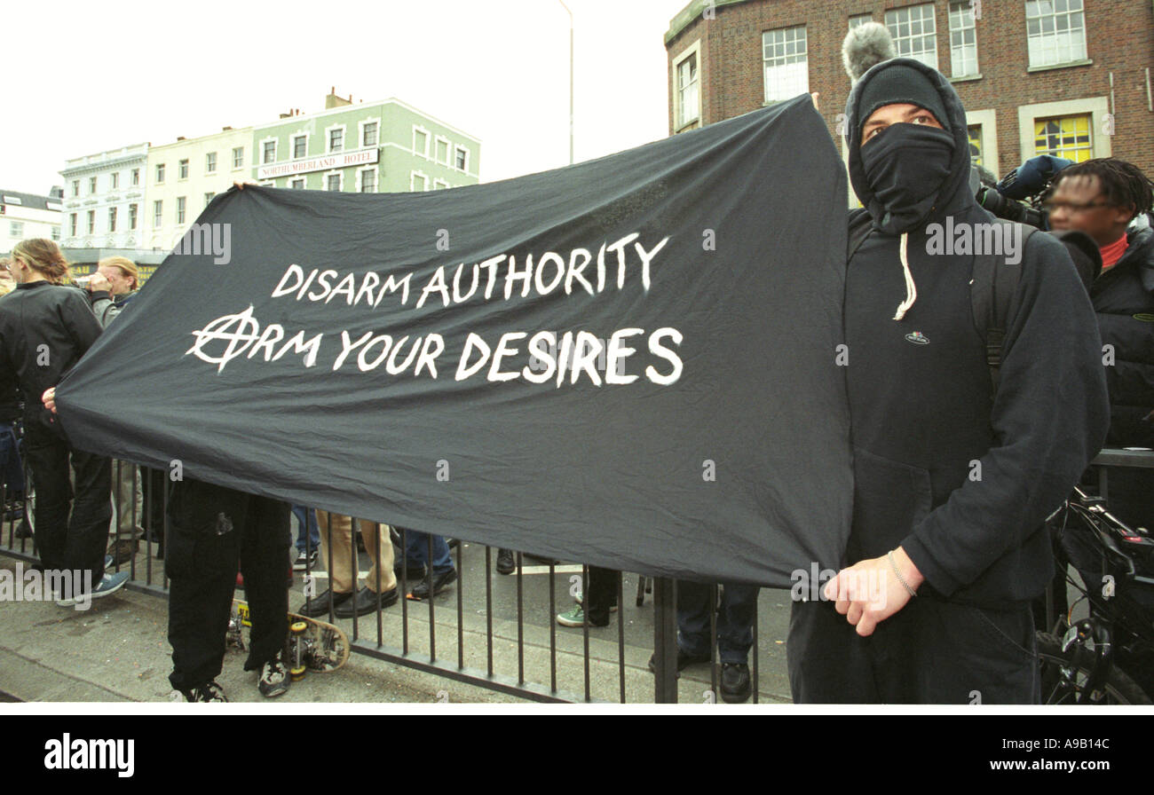 Anarcy banner Mayday protest London England UK Europe Stock Photo - Alamy