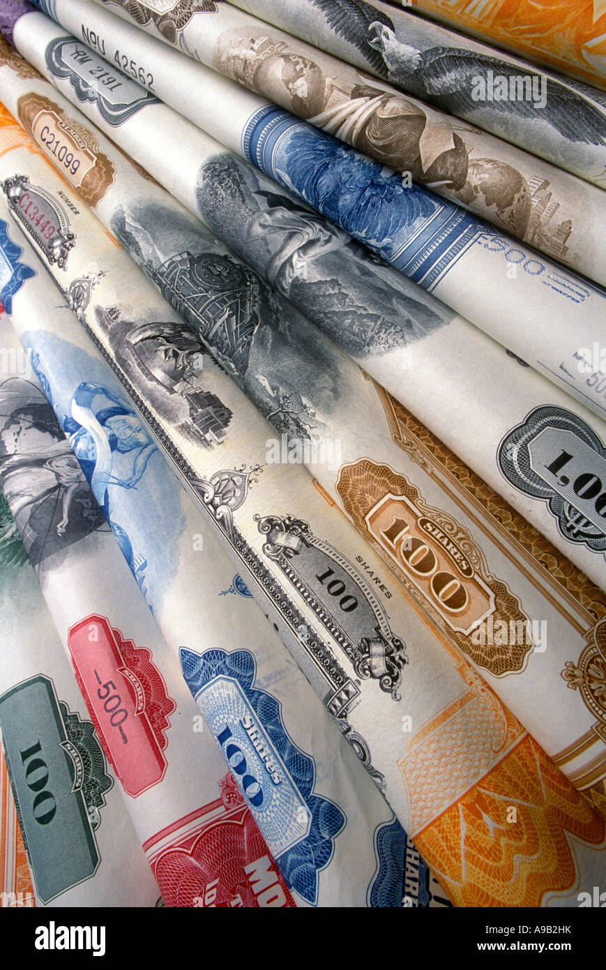 PILE OF PAPER BONDS AND STOCK CERTIFICATES OF UNITED STATES OF AMERICA ...