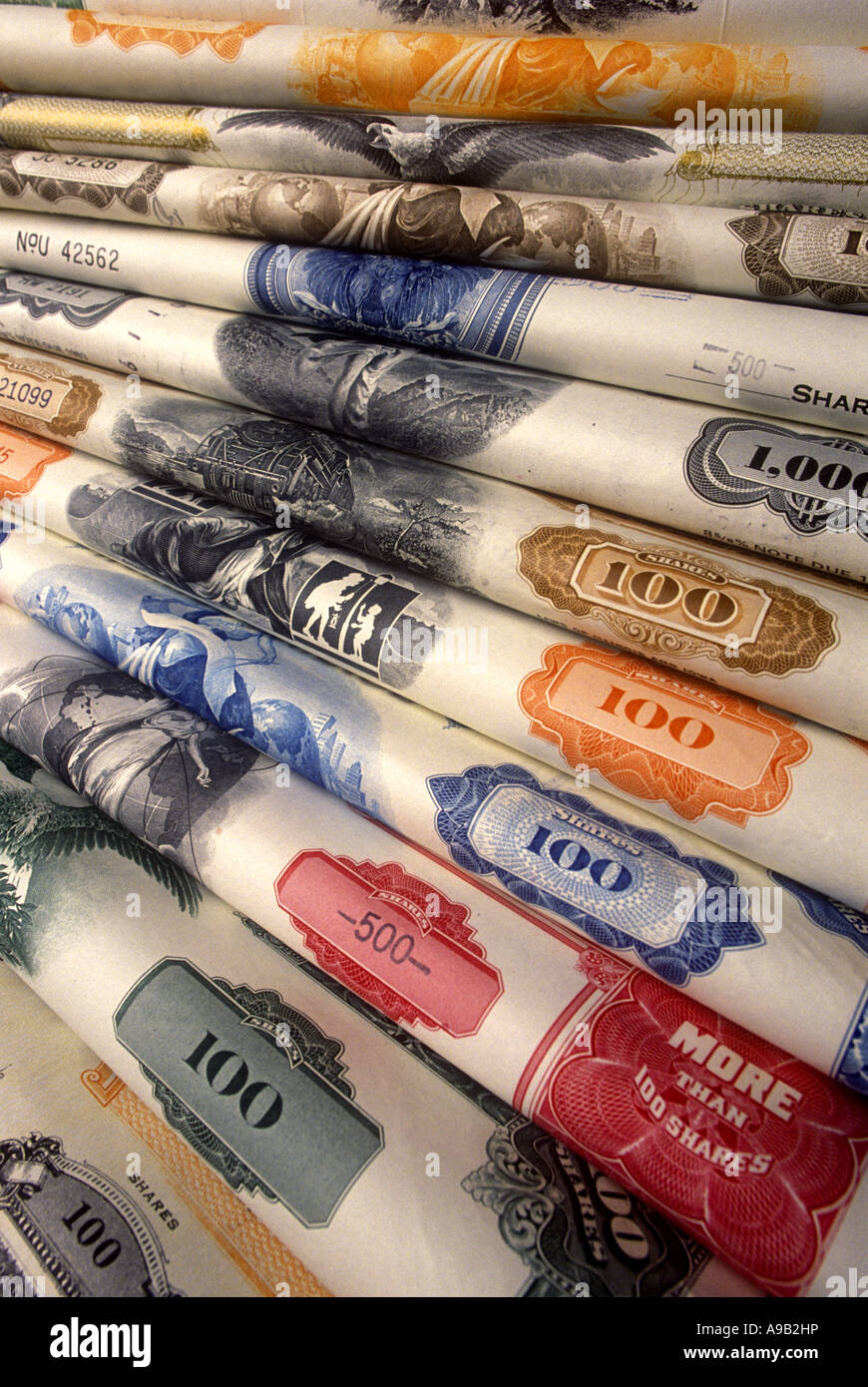 PILE OF PAPER BONDS AND STOCK CERTIFICATES OF UNITED STATES OF AMERICA ...