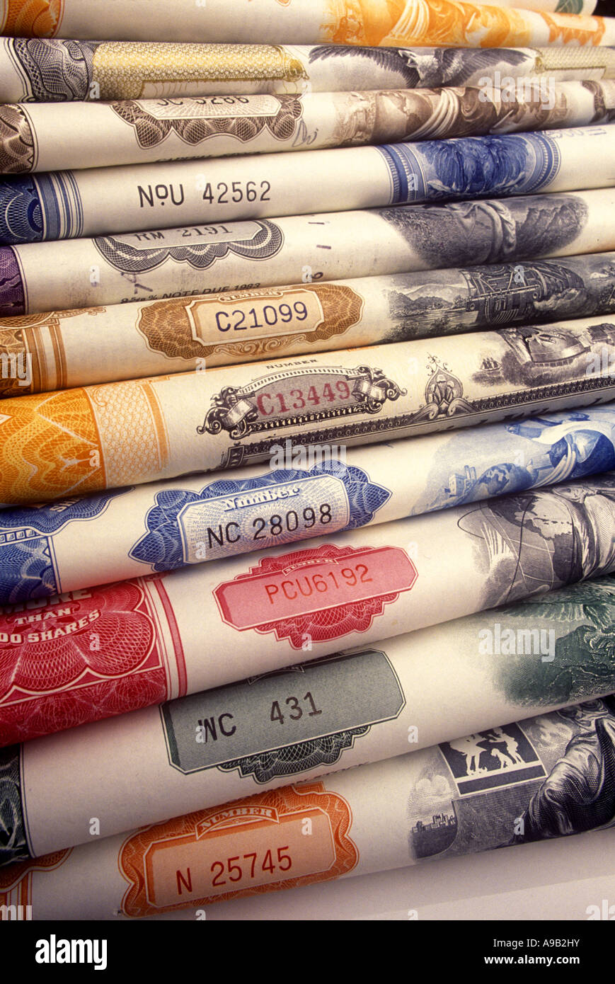 PILE OF PAPER BONDS AND STOCK CERTIFICATES OF UNITED STATES OF AMERICA ...