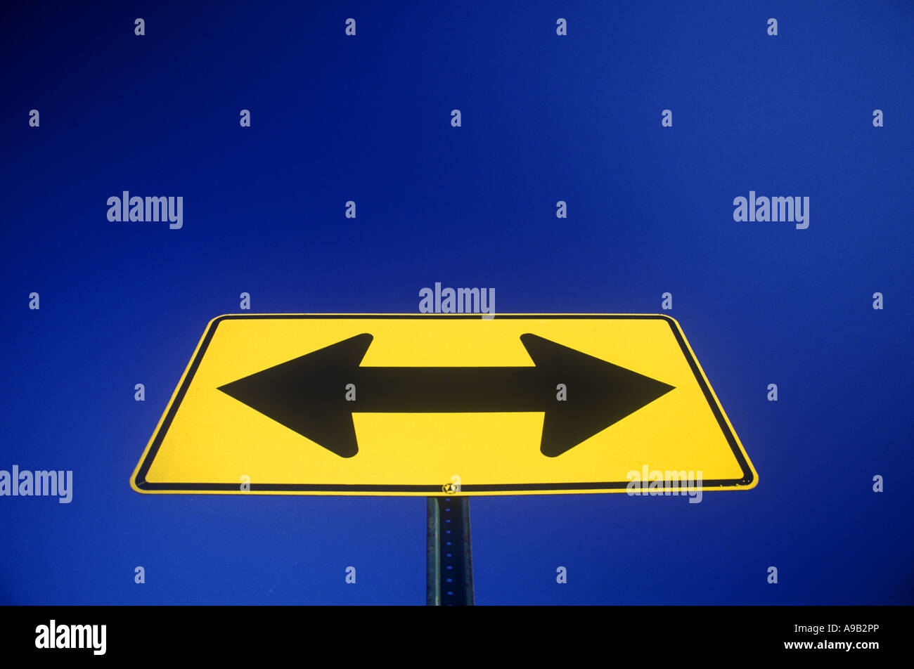 Yellow road junction sign hi-res stock photography and images - Alamy
