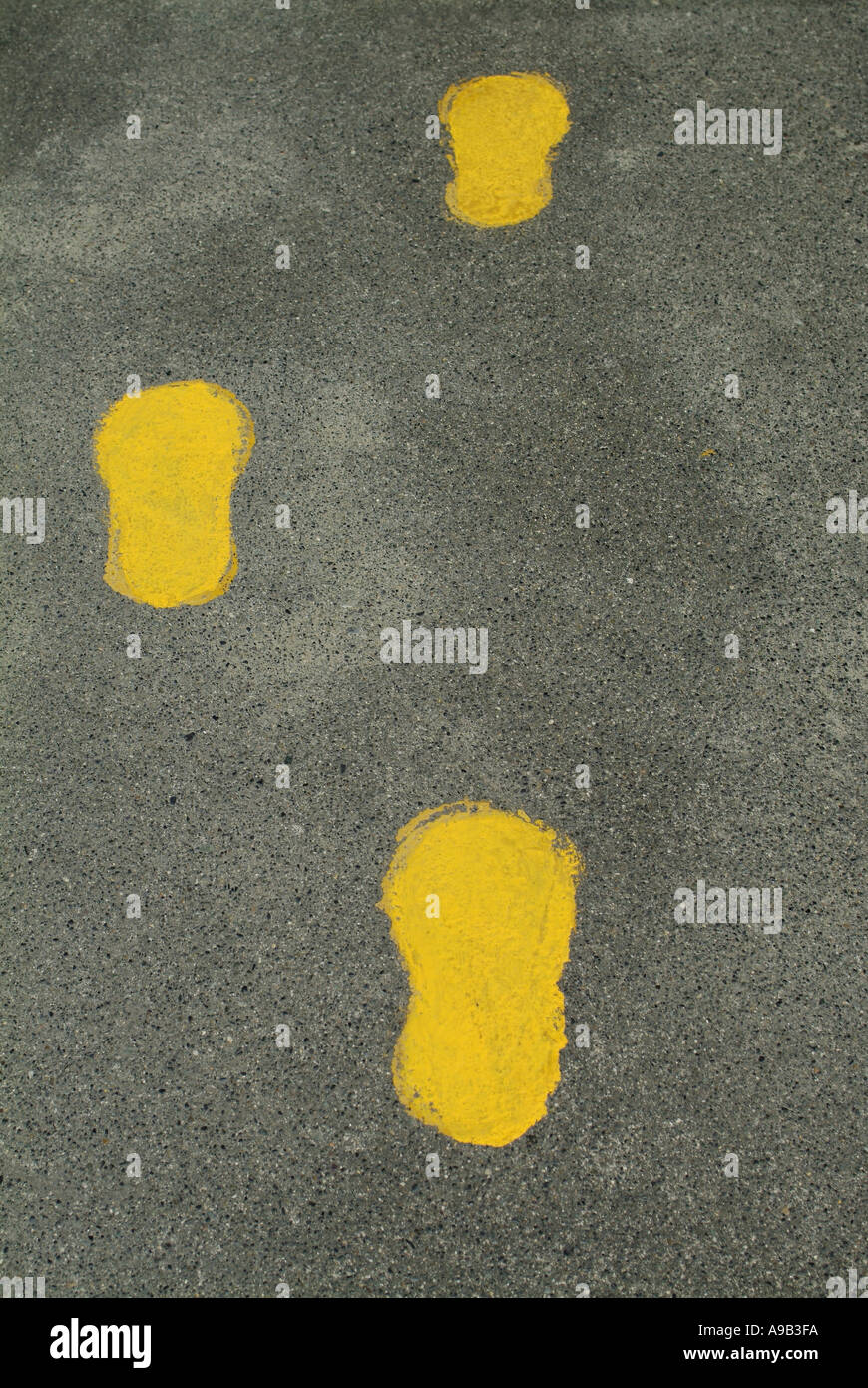 Painted footsteps on pavement Chemainus Vancouver Island British ...