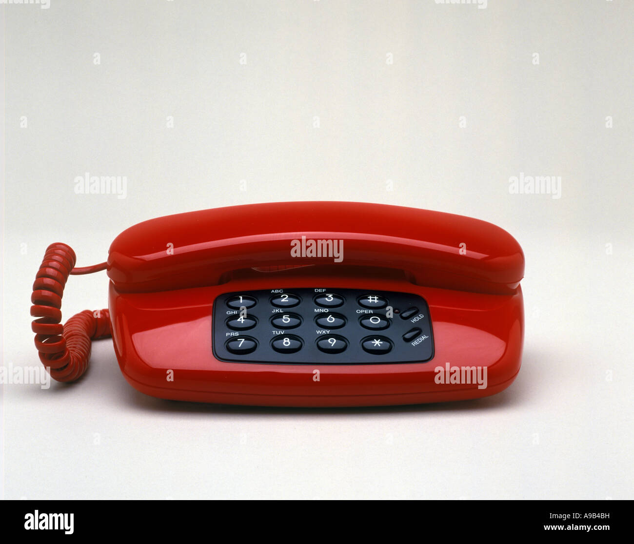 RED TELEPHONE ON WHITE BACKGROUND Stock Photo - Alamy