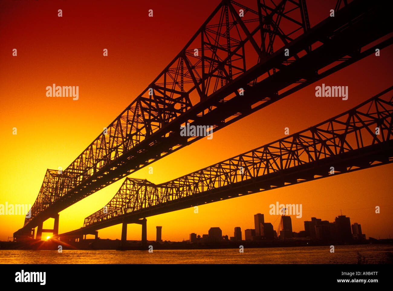 DOWNTOWN SKYLINE CRESCENT CITY BRIDGES MISSISSIPPI RIVER NEW ORLEANS ...