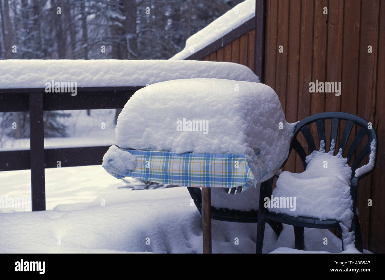 Snow covered table Stock Photo - Alamy