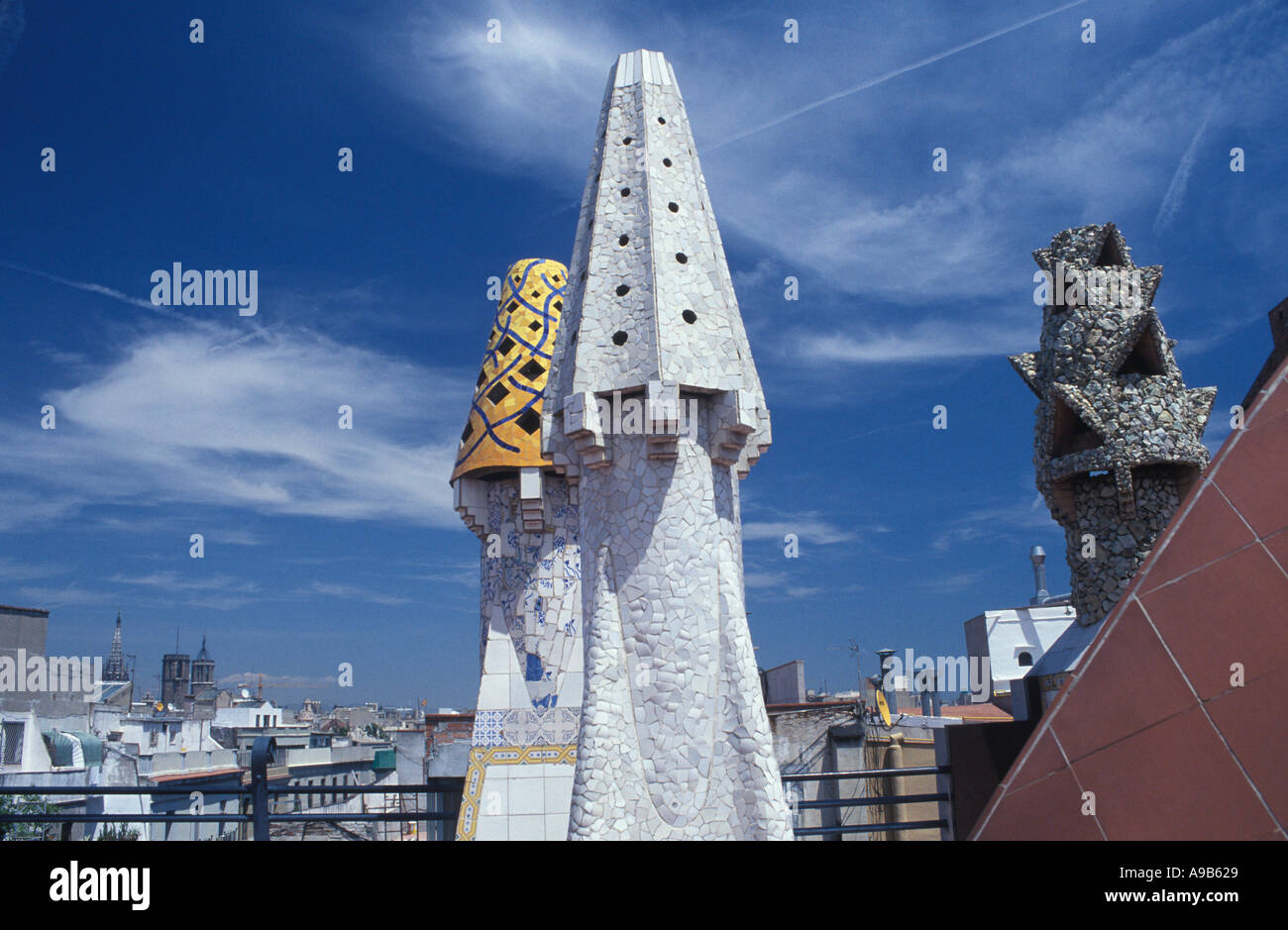 Coloured chimney Palau Guell, Barcelona Stock Photo - Alamy