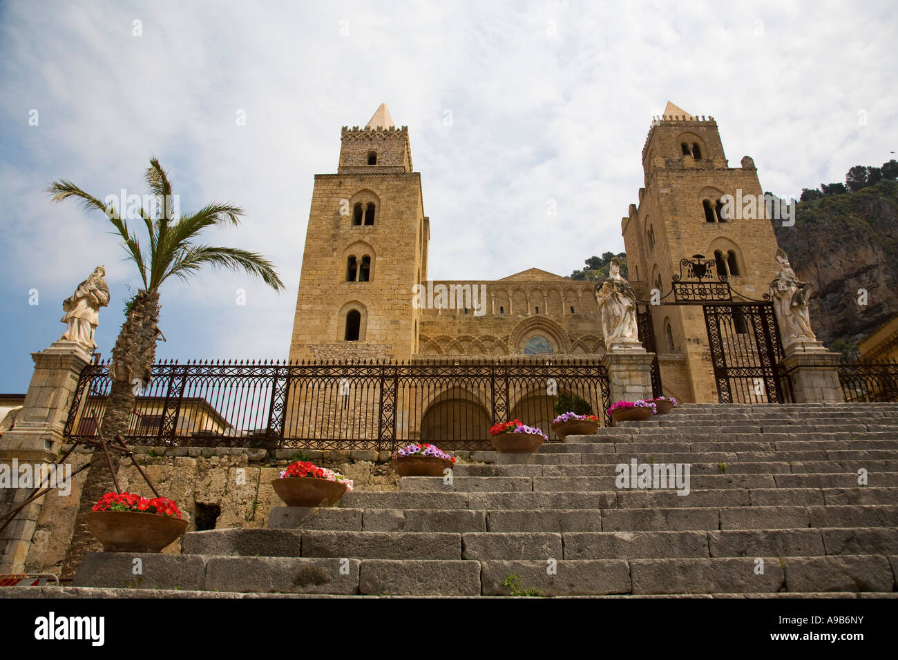 Flower pots on steps of Norman Cathedral Piazza Duomo Cefalu Sicily ...