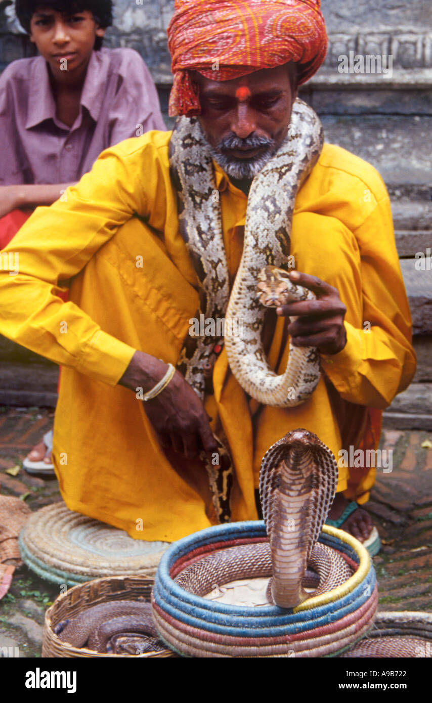 Snake performer in Pashupatinath Nepal Stock Photo - Alamy