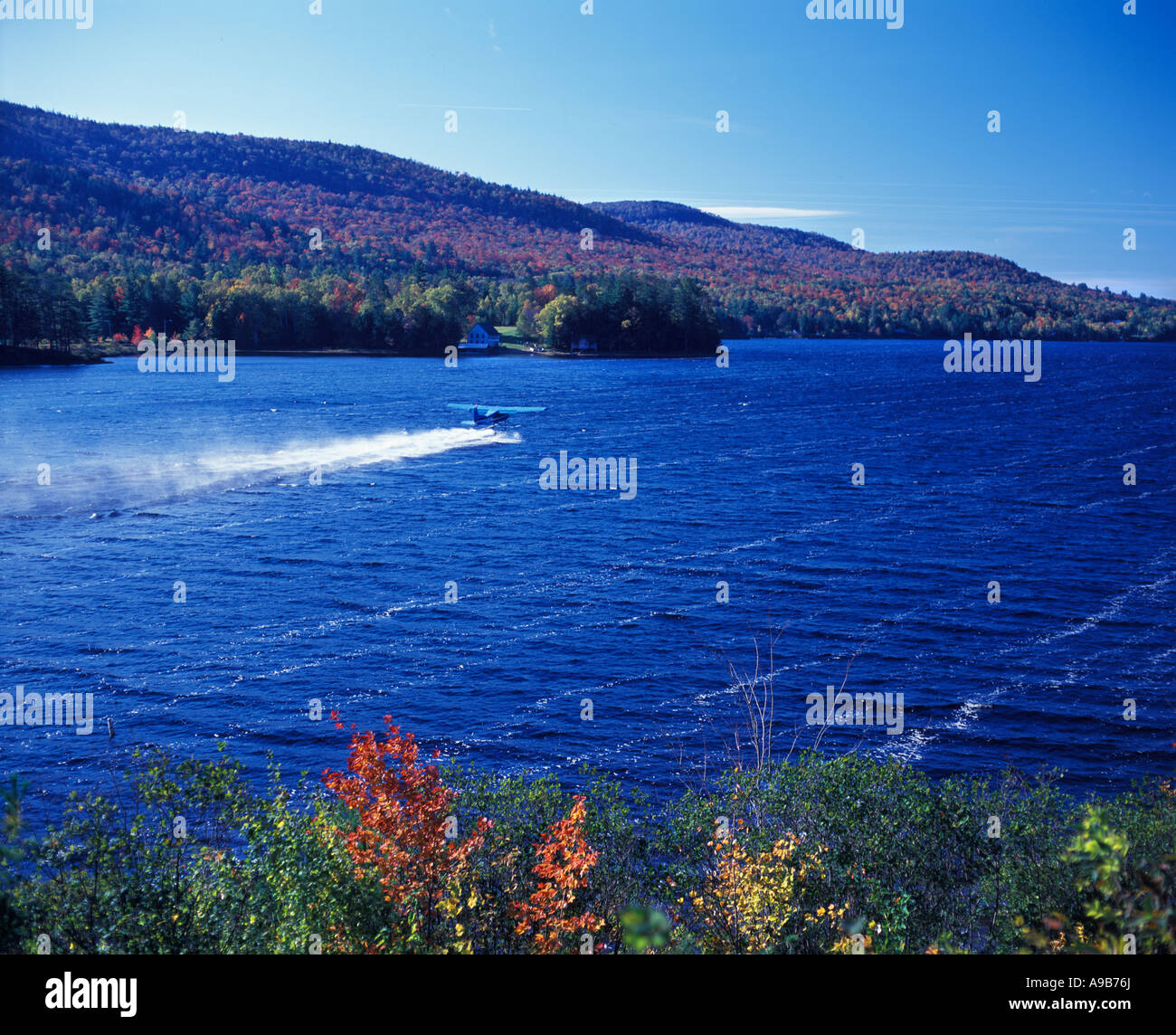 SIGHTSEEING FLOAT AIRPLANE TAKING OFF LONG LAKE ADIRONDACK PARK NEW ...