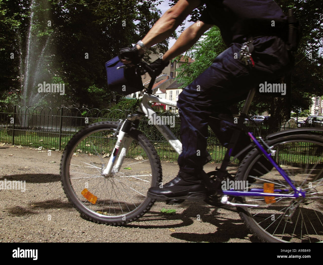 Policeman on bicycle hi-res stock photography and images - Alamy