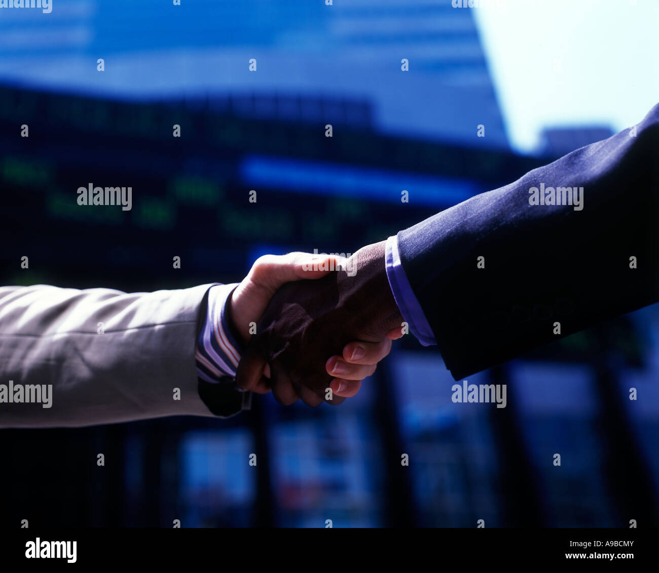 Men handshake street hi-res stock photography and images - Alamy