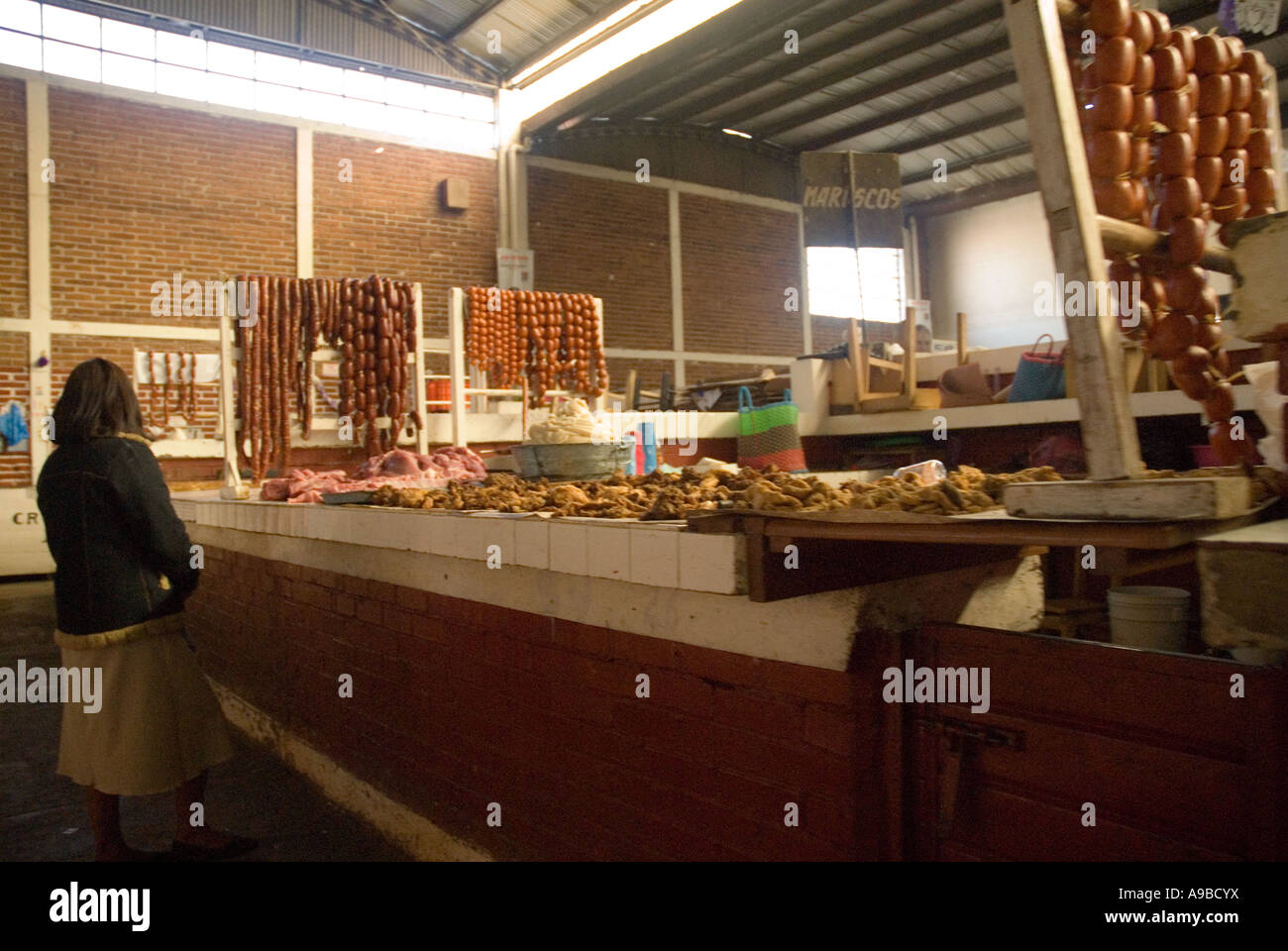 woman buy meat in the market of San Cristobal de las Casas Stock Photo ...