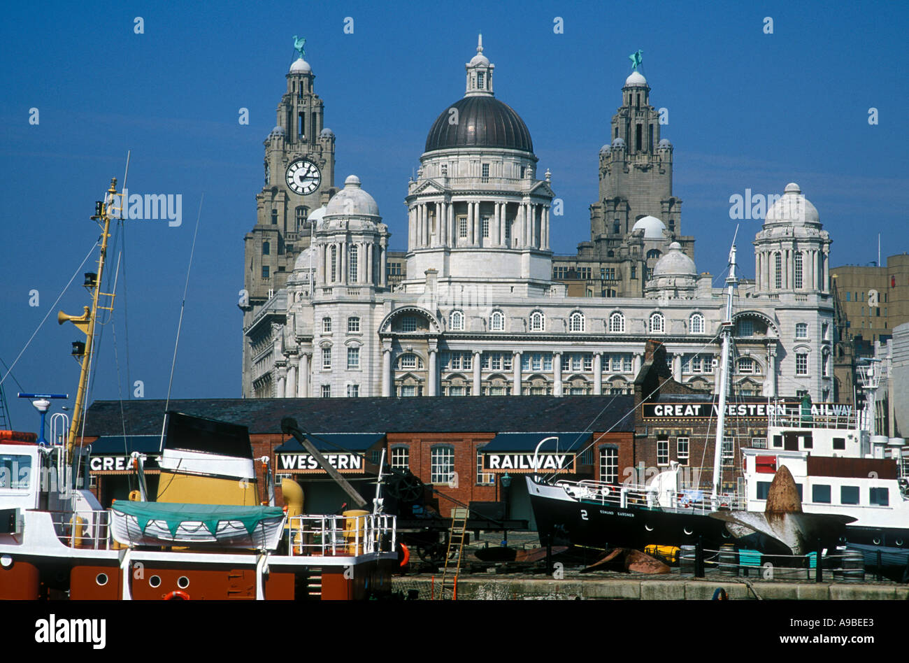Preserved docks and vessels with Port of Liverpool and Liver Buildings ...