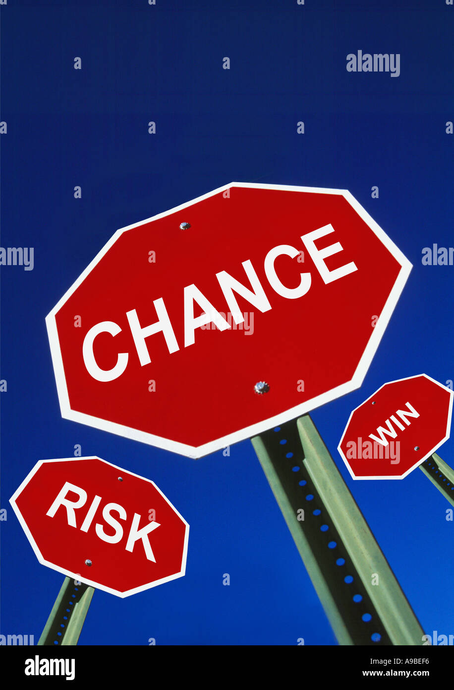 Risk Chance Win Road signs Financial Concept Stock Photo - Alamy