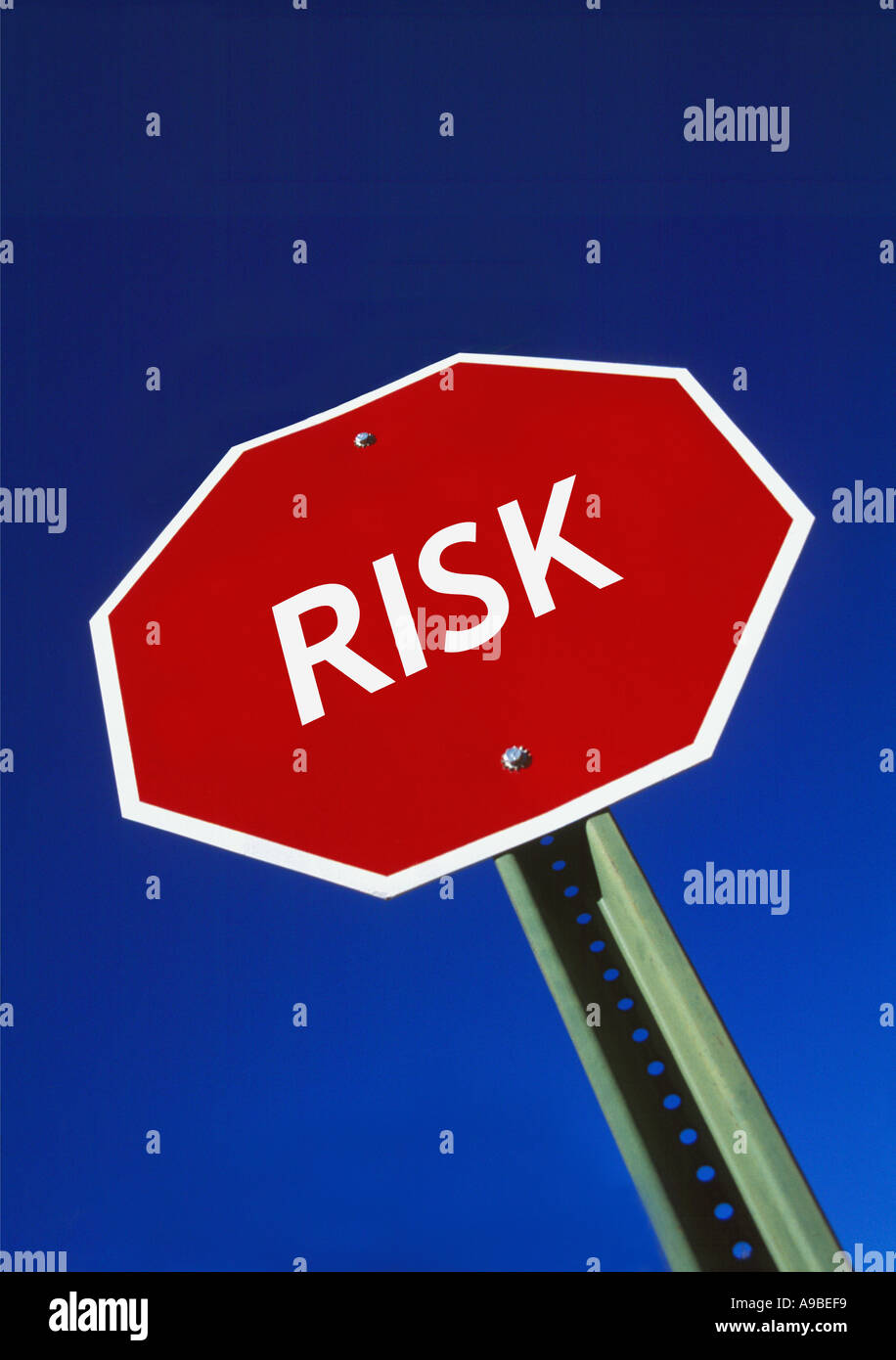 Conceptual Risk Road sign Stock Photo - Alamy