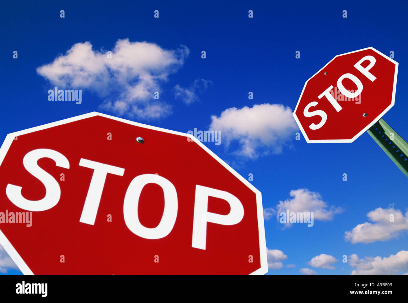 Two Stop Road signs Stock Photo - Alamy