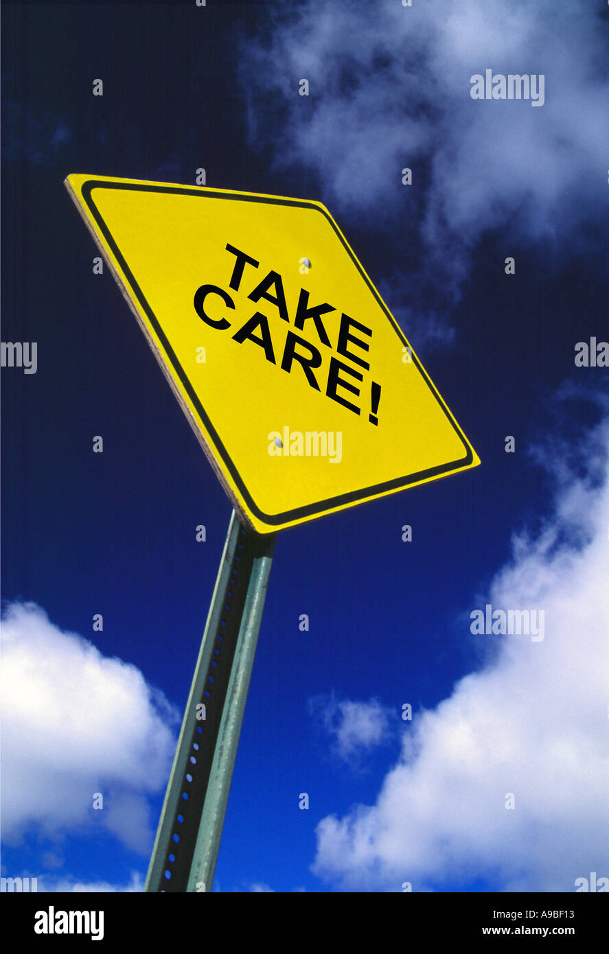Conceptual Road Sign Take Care Stock Photo - Alamy