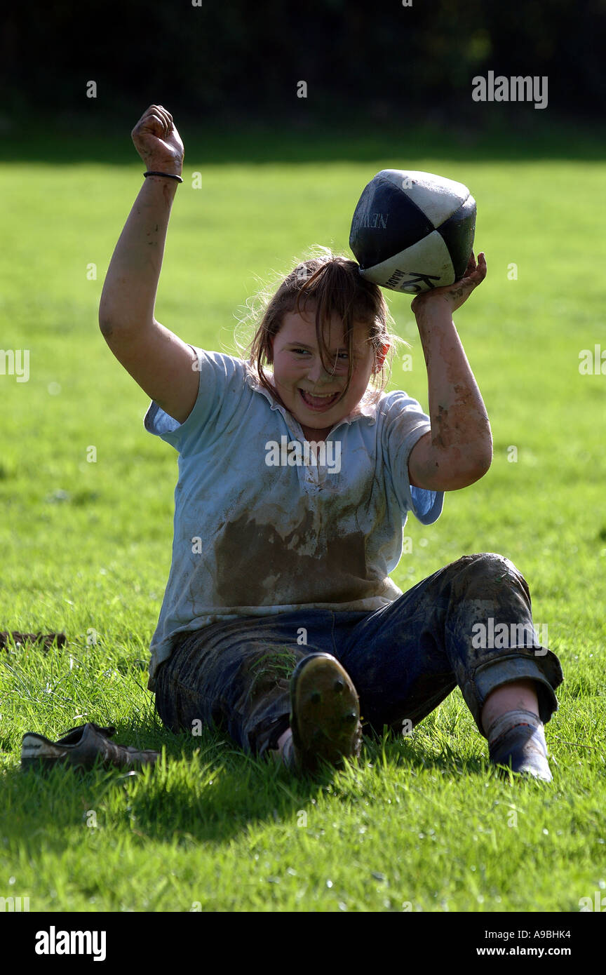 Girl playing rugby Stock Photo - Alamy