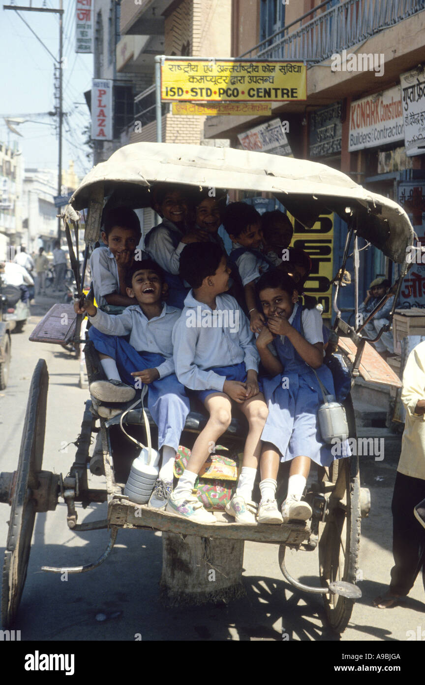 School kids in rickshaw india hi-res stock photography and images - Alamy