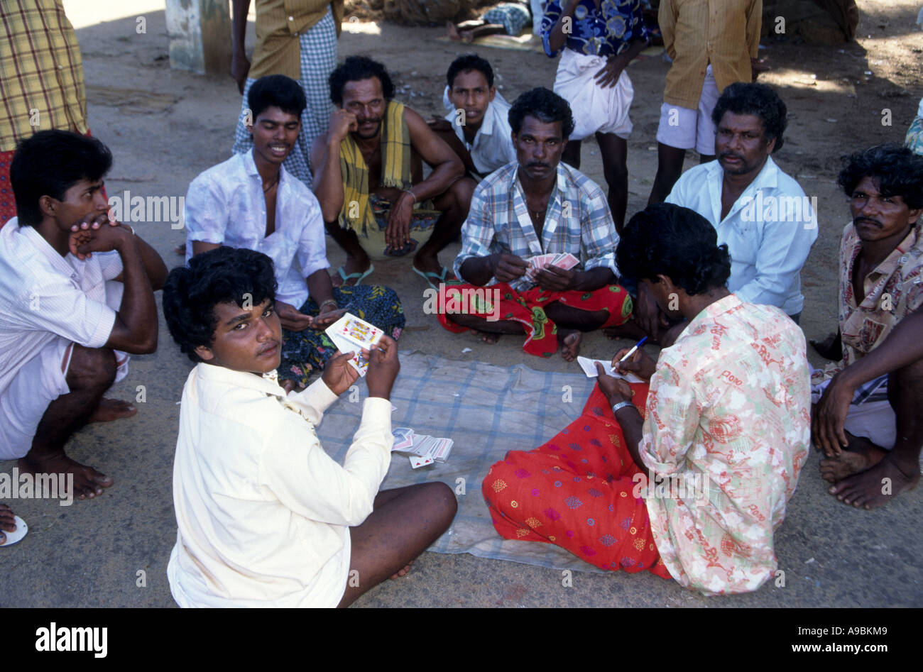 Group of Indian workmen playing cards.Kerala India Stock Photo - Alamy