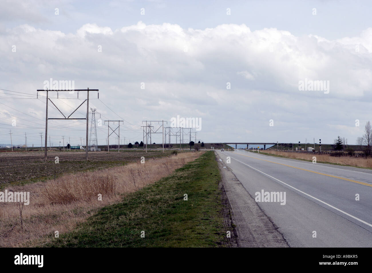 Highway beside high voltage power transmission lines, Delta, British ...