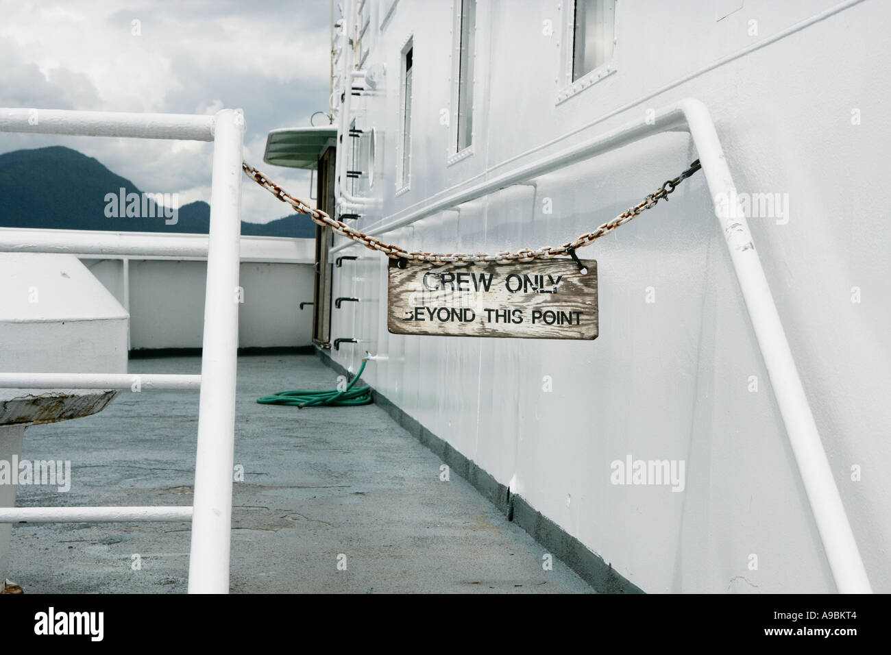 Crew only area, chain and sign restricting access to bridge on ferry ...