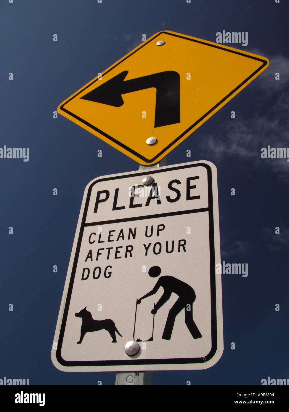 AJD42611, road signs, Sharp Turn left Stock Photo - Alamy