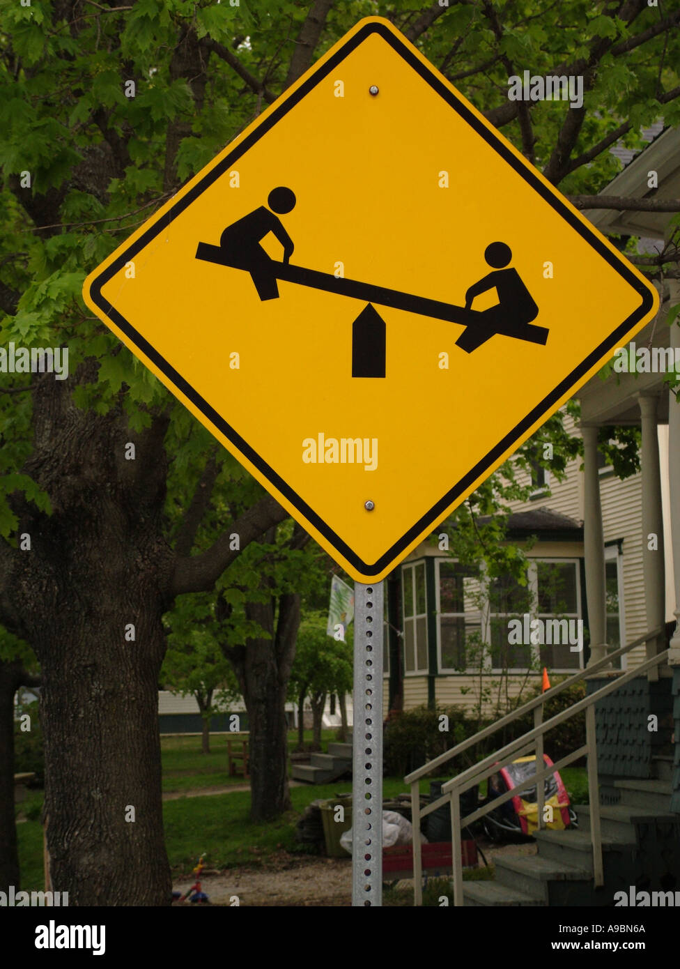 Children playing road signs warning hi-res stock photography and images ...