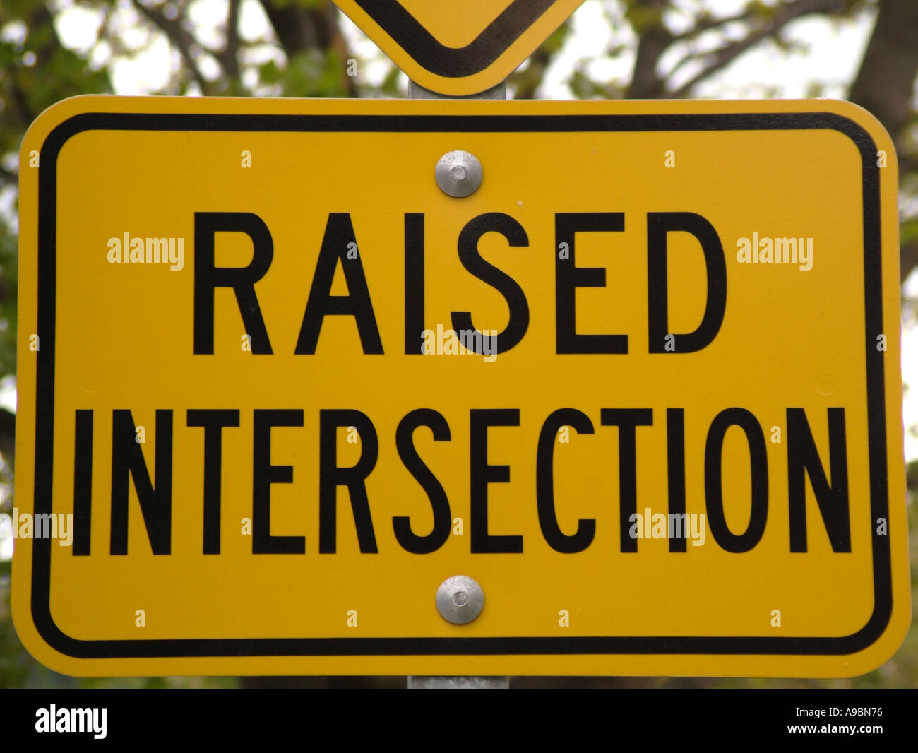 AJD42665, road sign, Raised Intersection sign, speed bump Stock Photo ...
