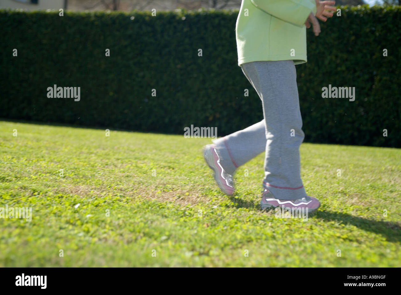Child walking alone outdoors Stock Photo - Alamy