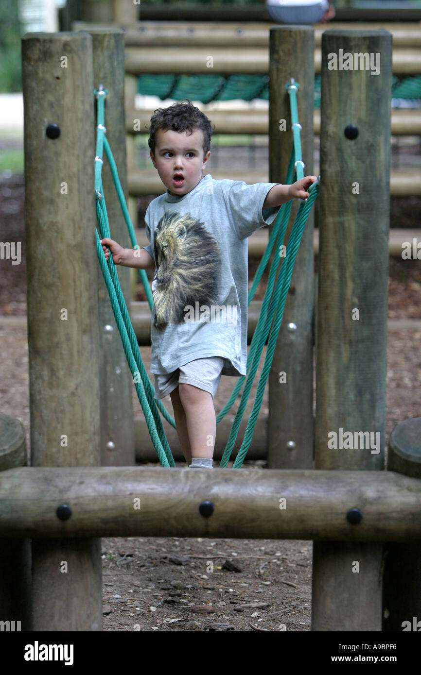 Children crossing rope bridge hi-res stock photography and images - Alamy