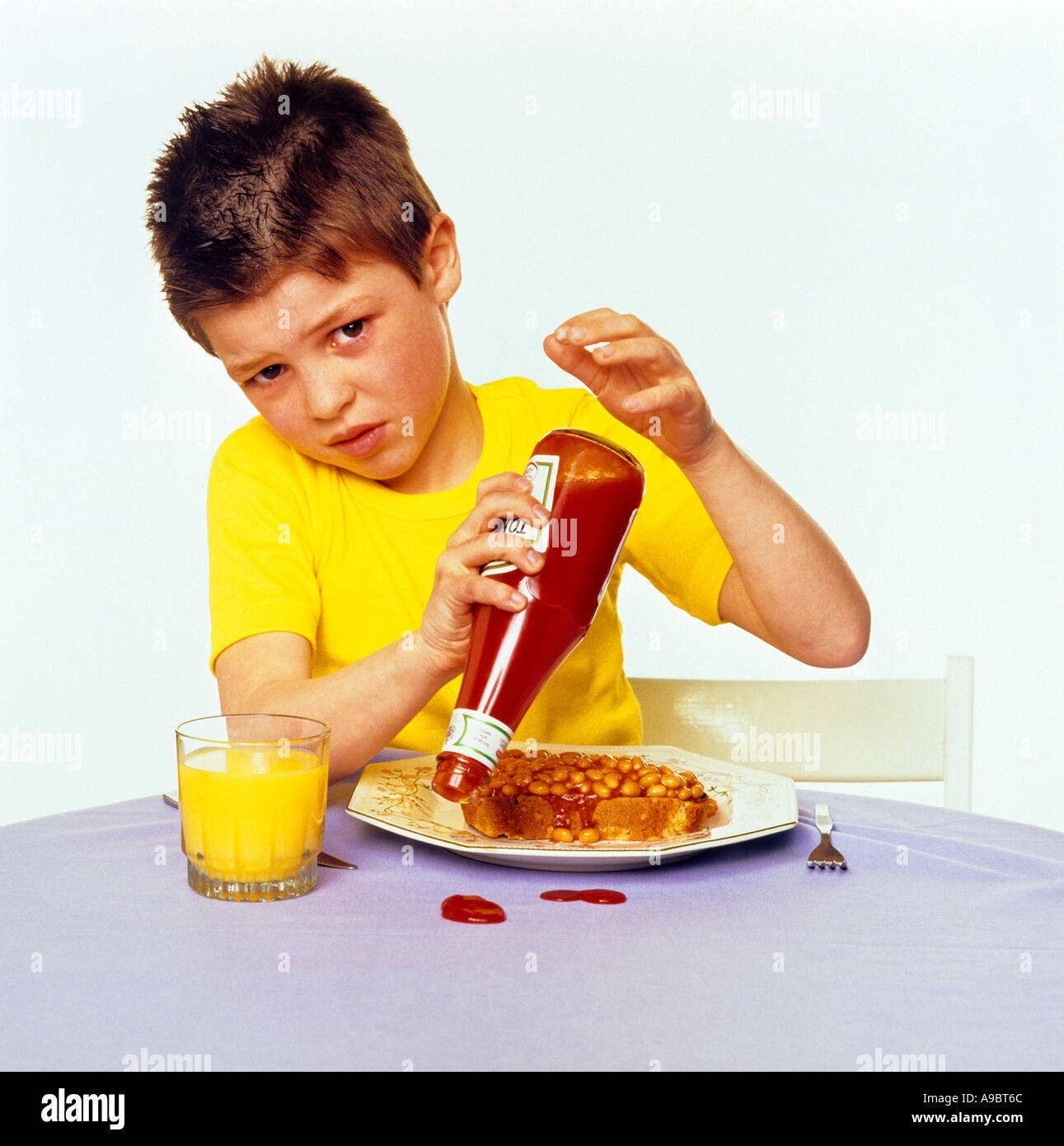 Boy with ketchup hi-res stock photography and images - Alamy