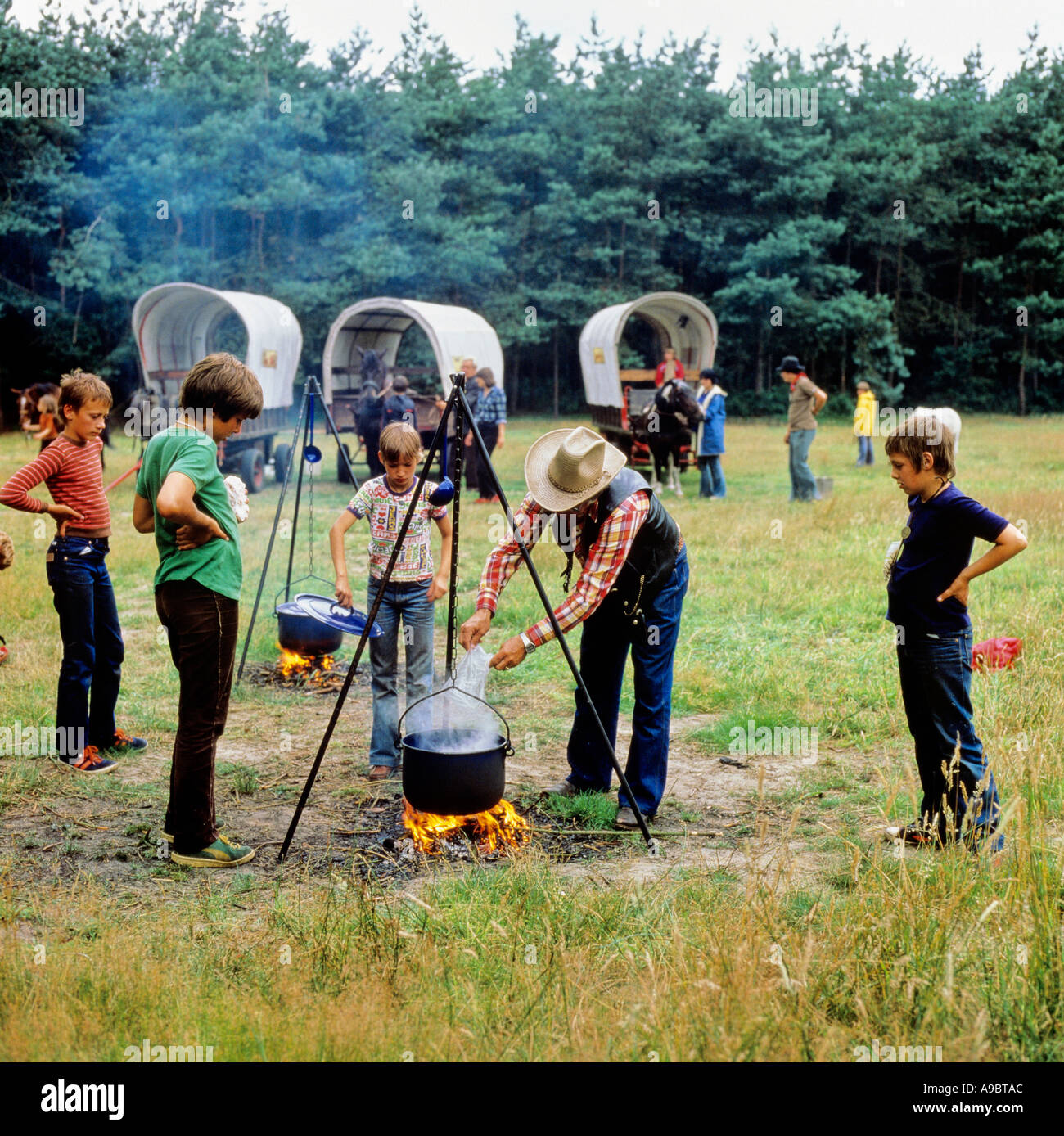 campfire of boy and girl scouts at horse trekking adventure tours Stock ...