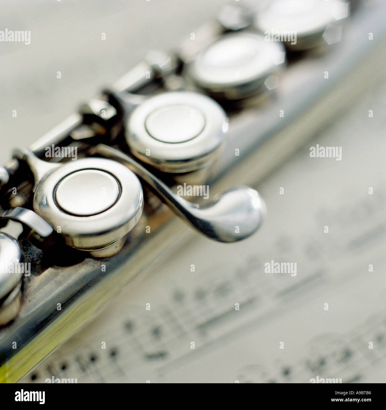 detail of transverse flute and notes Stock Photo - Alamy