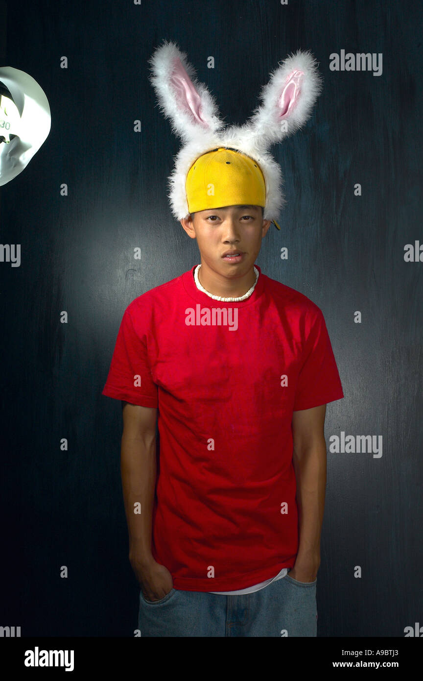 Asian teenager with rabbit ears portrait Stock Photo - Alamy