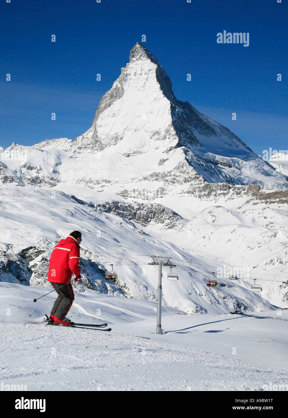 Skier in Zermatt Switzerland with Matterhorn in background Stock Photo ...