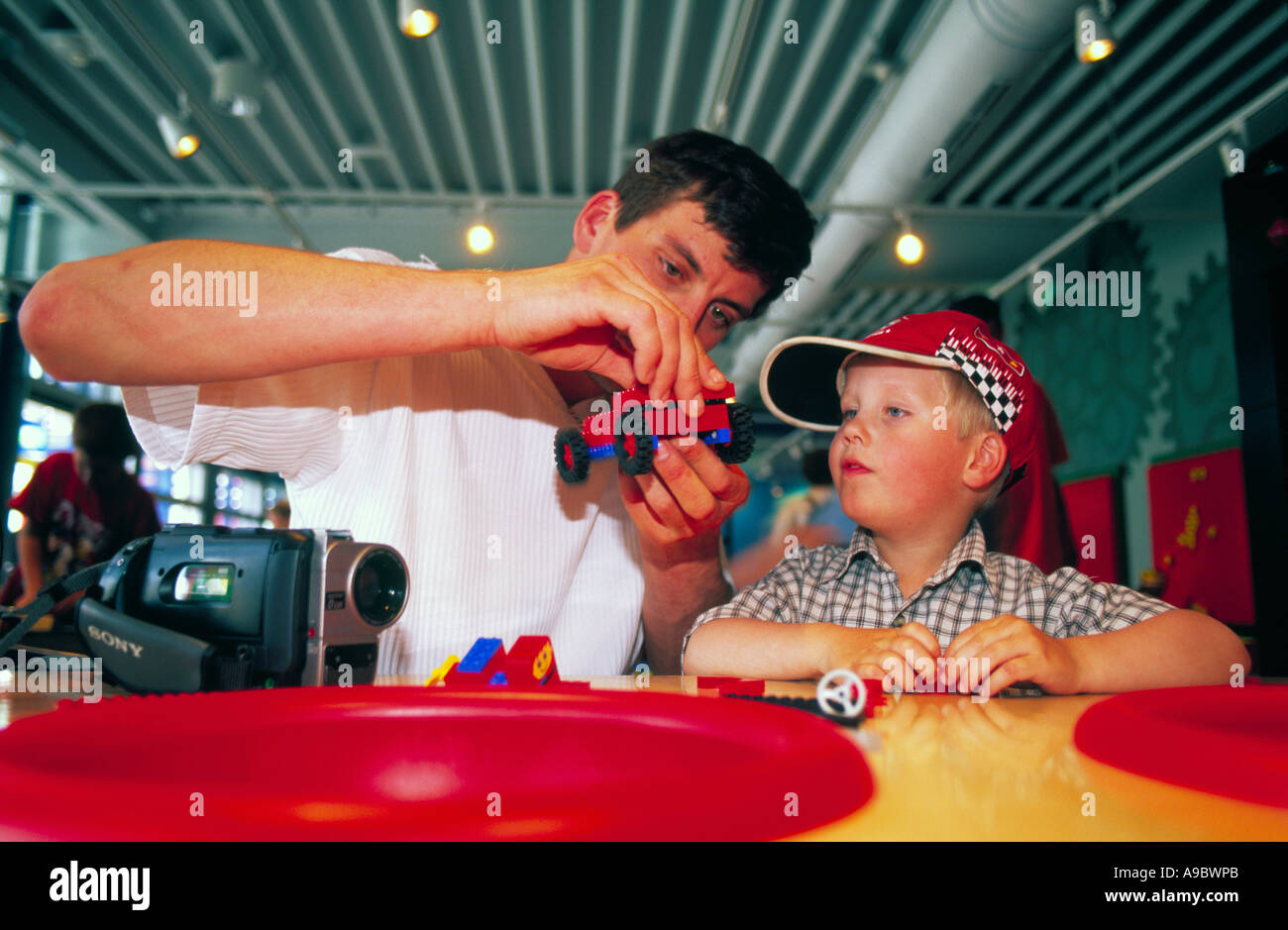 Putting lego together hi-res stock photography and images - Alamy