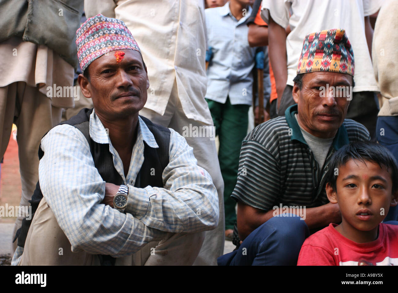 Modern day village in Nepal. People looking Stock Photo - Alamy
