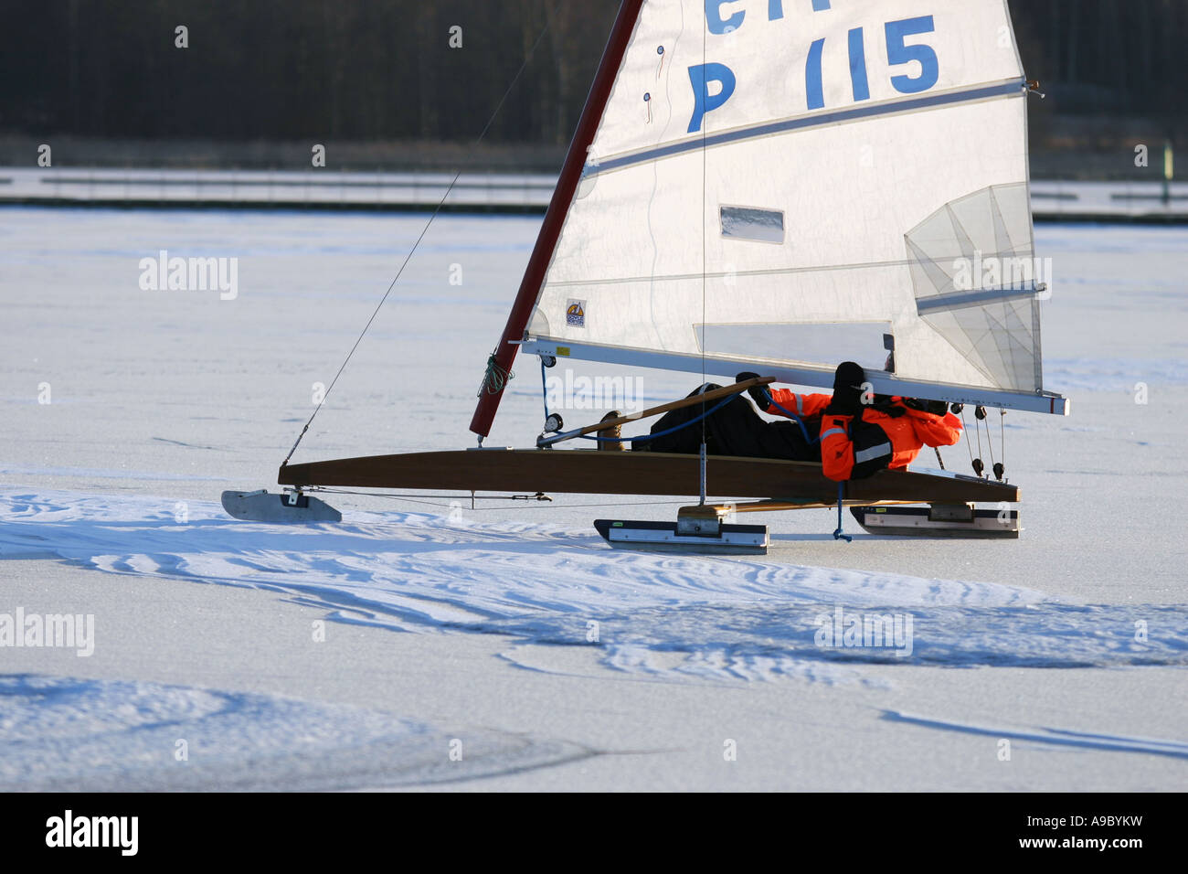 Man on an ice yacht in Sweden Stock Photo - Alamy