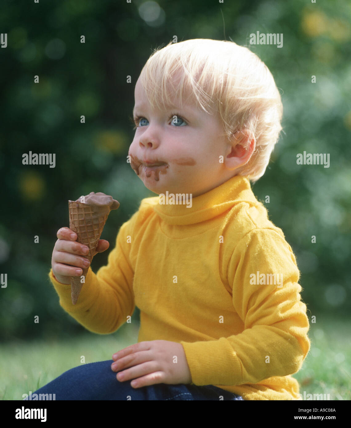 Boy with ice cream cone hi-res stock photography and images - Alamy